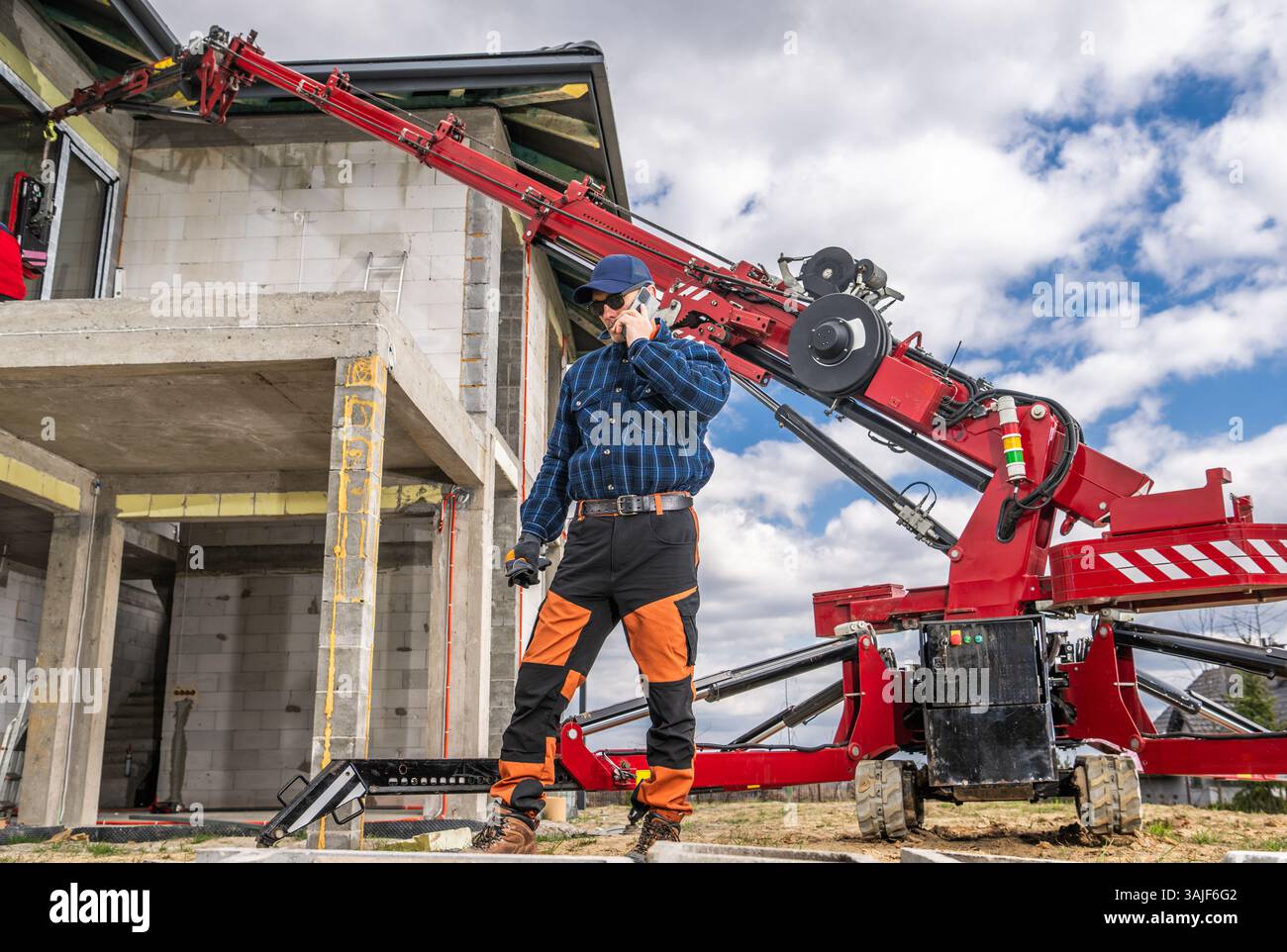 Construction worker stands thoughtfully hi-res stock photography and images - Alamy