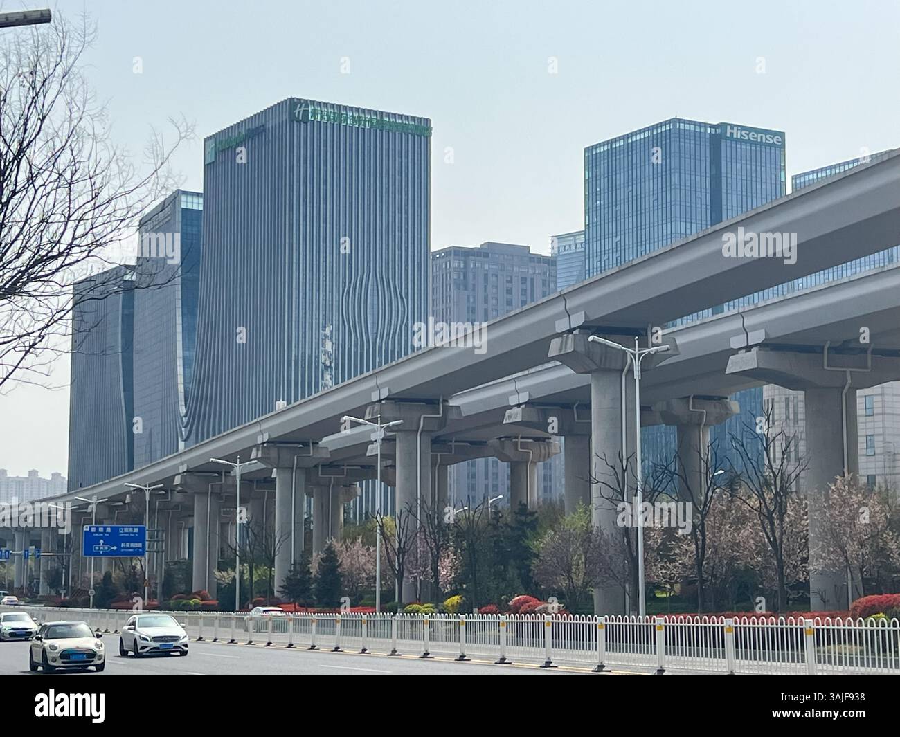 A Modern Urban Landscape Features a Dynamic Elevated Transit System ...