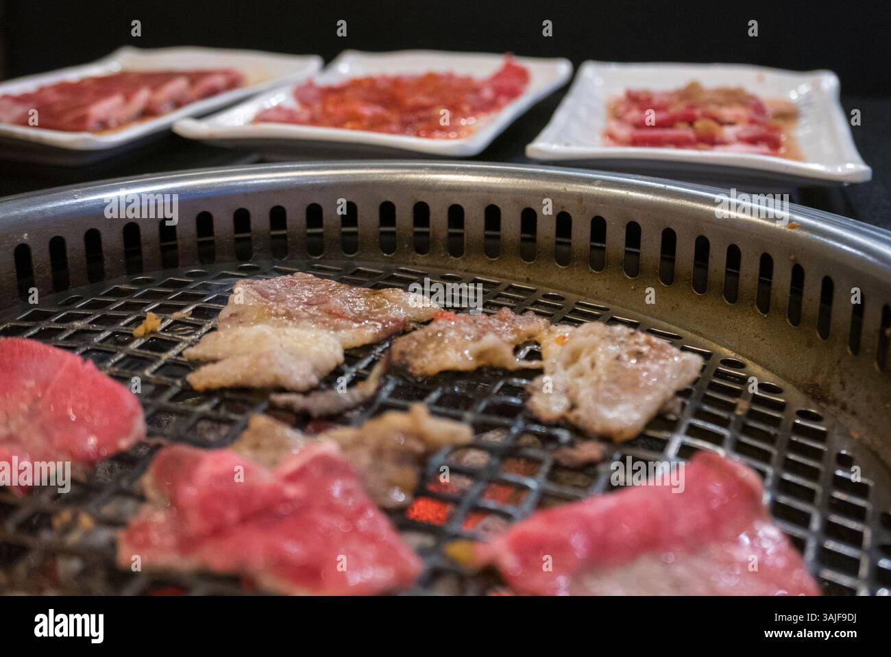 Grilling meat on korean bbq hi-res stock photography and images - Alamy