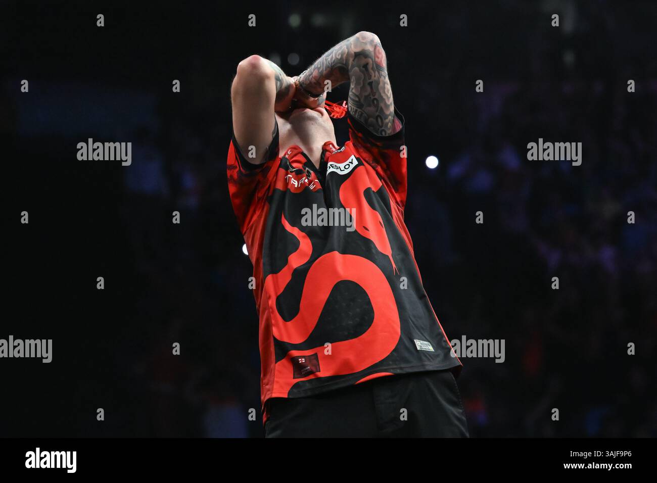 Nathan Aspinall reacts during the Darts 2025 BetMGM Premier League - at ...