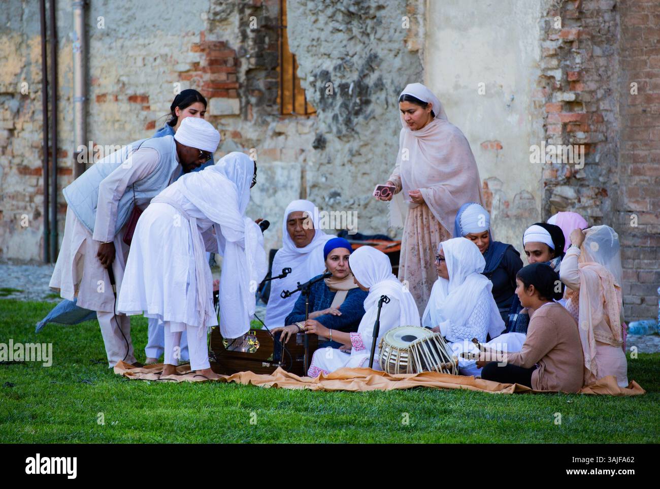 Traditional Arabic women musicians performing live outdoors, cultural ...