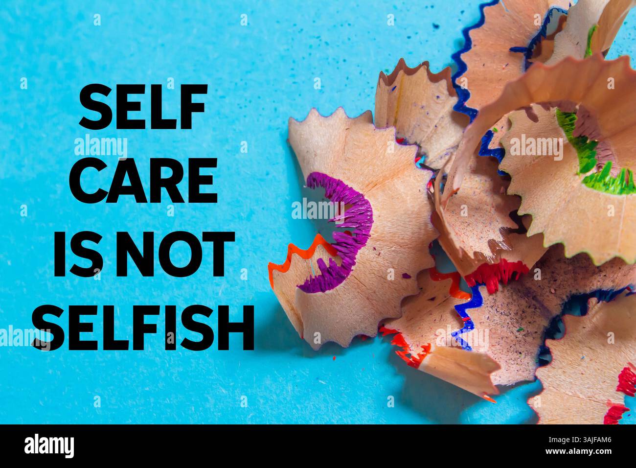 Self care is not selfish message written on blue background. Conceptual ...