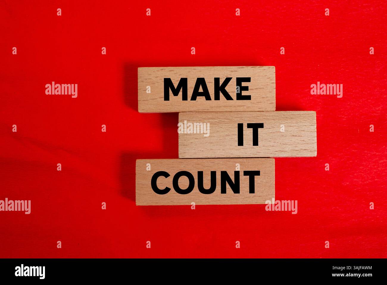 Make it count message written on wooden blocks on red background ...