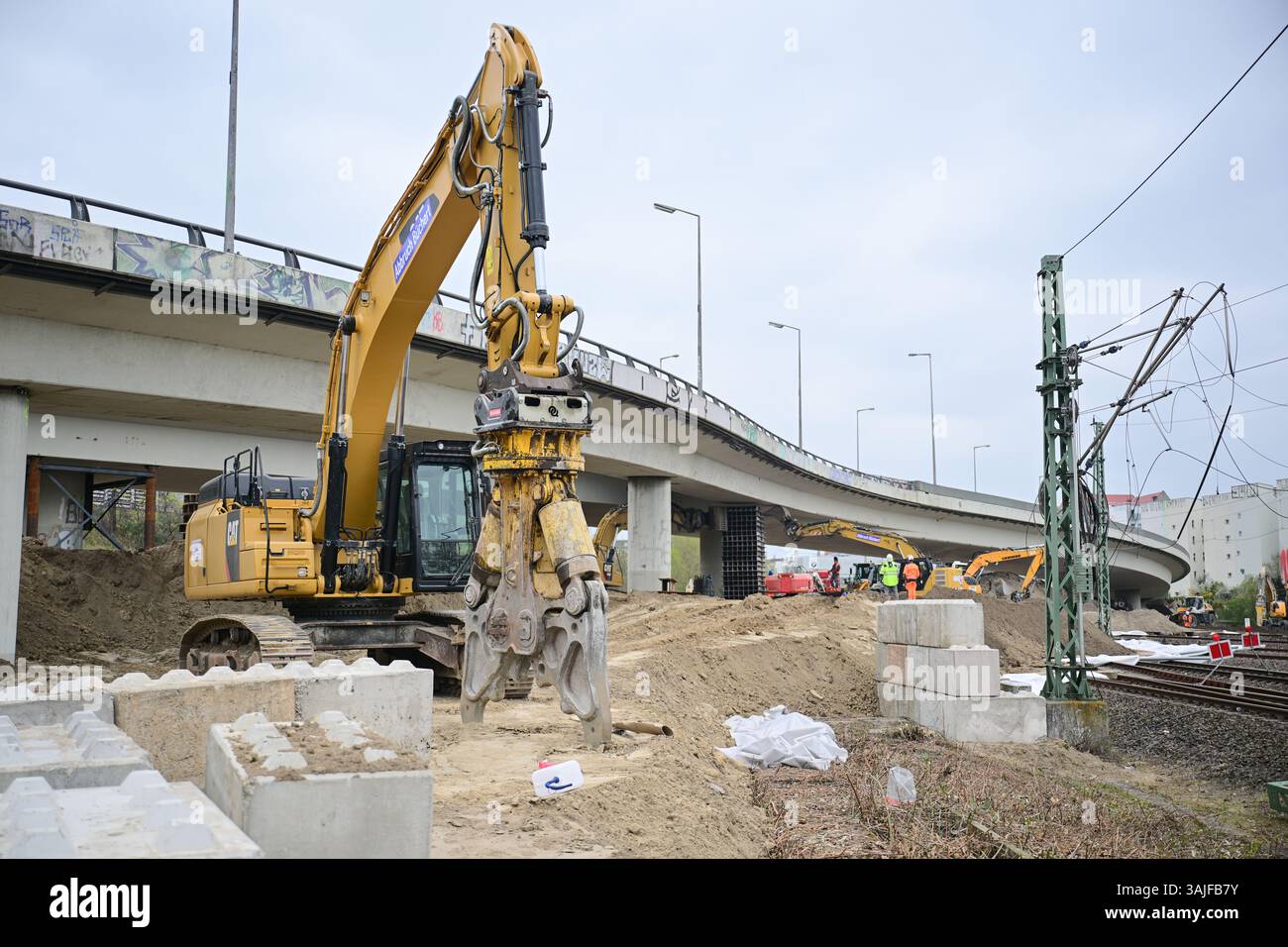 Berlin, Germany. 11th Apr, 2025. Demolition equipment stands at the ...