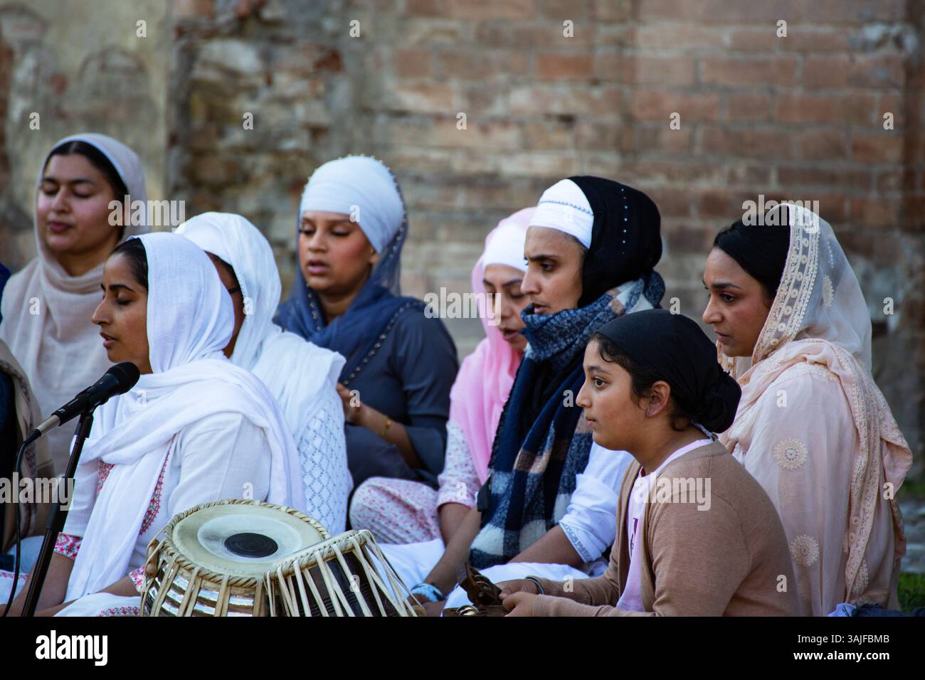 Park performance of Arabic women singing spiritual songs with harmonium ...
