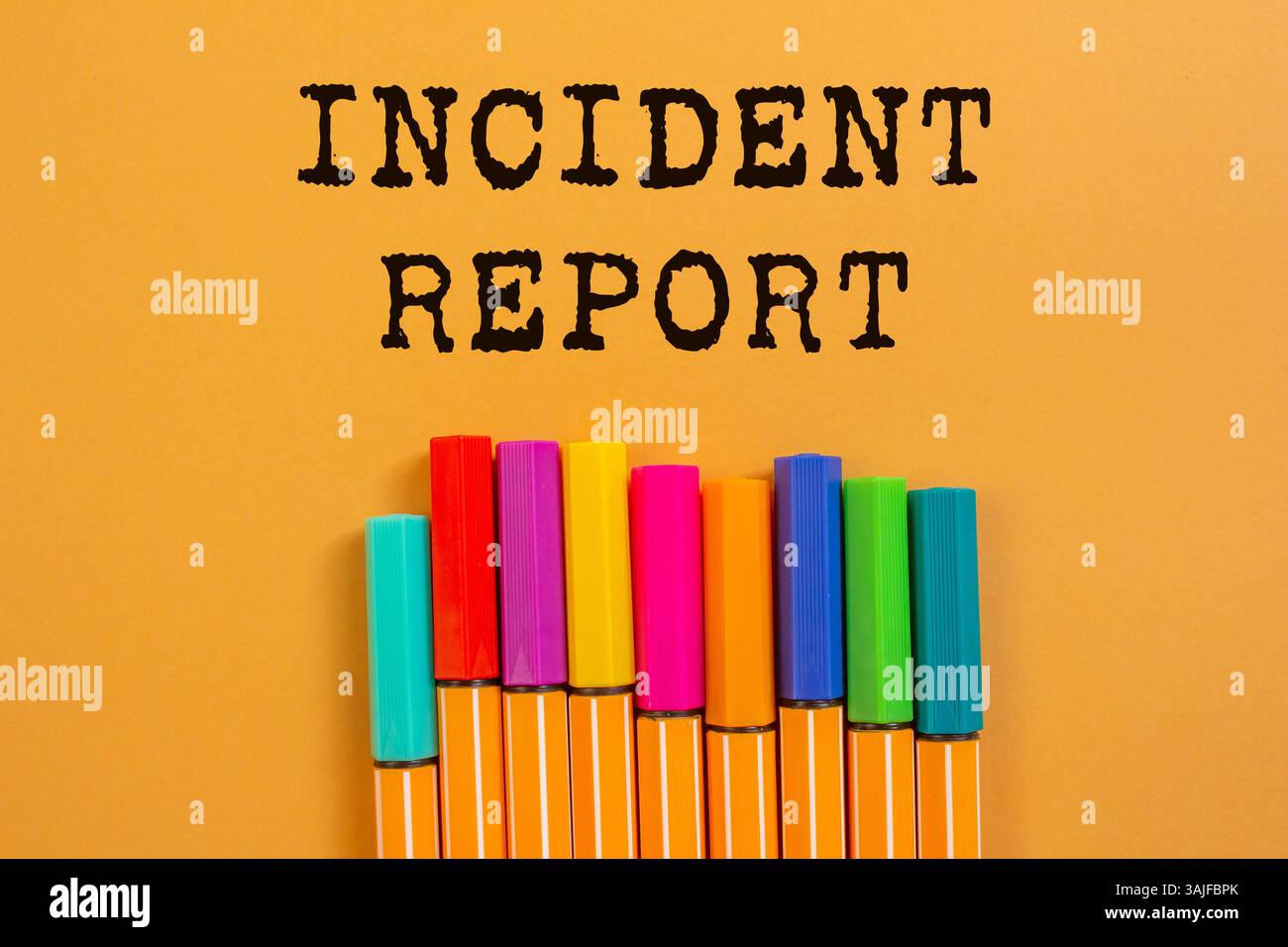 Incident report message written on orange background. Conceptual ...