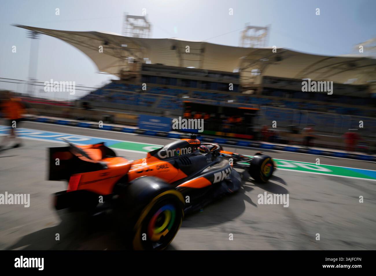 McLaren driver Oscar Piastri of Australia leaves the pit lane during ...