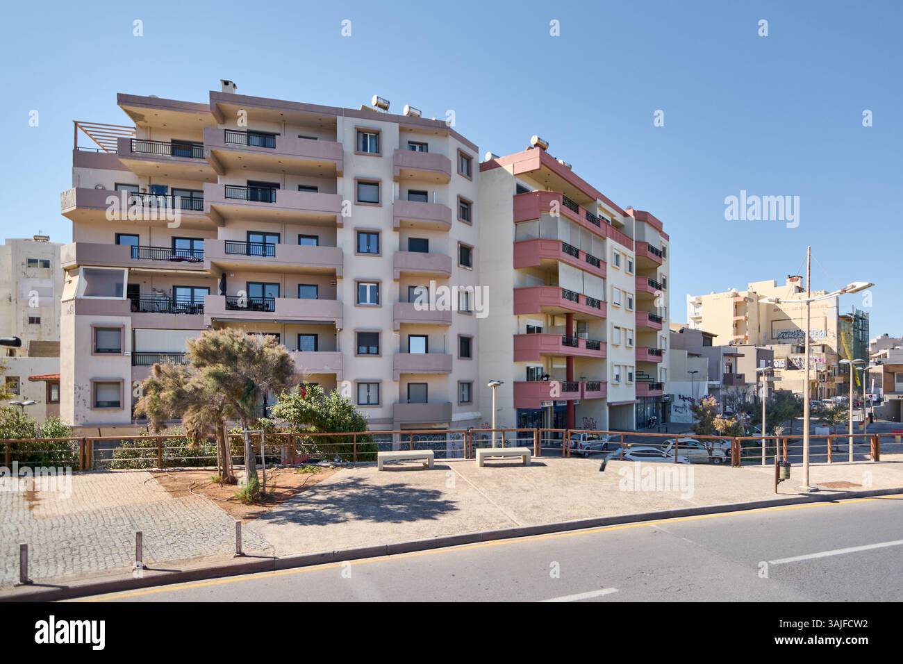 Crete.Greece - april 11, 2025: A sunny urban street in Crete featuring ...
