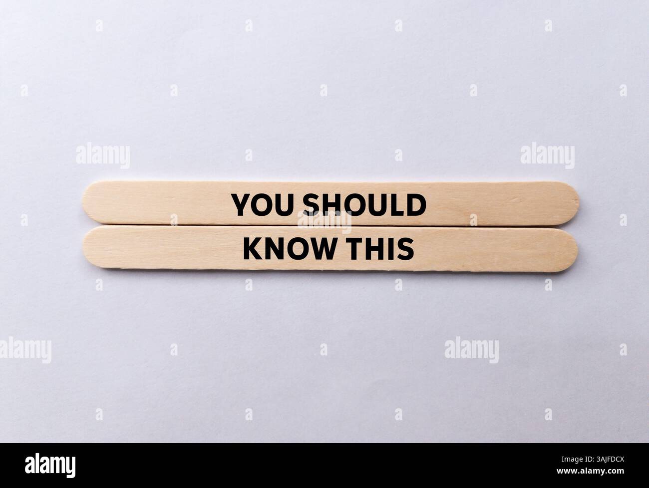 You should know this message written on wooden sticks on white ...