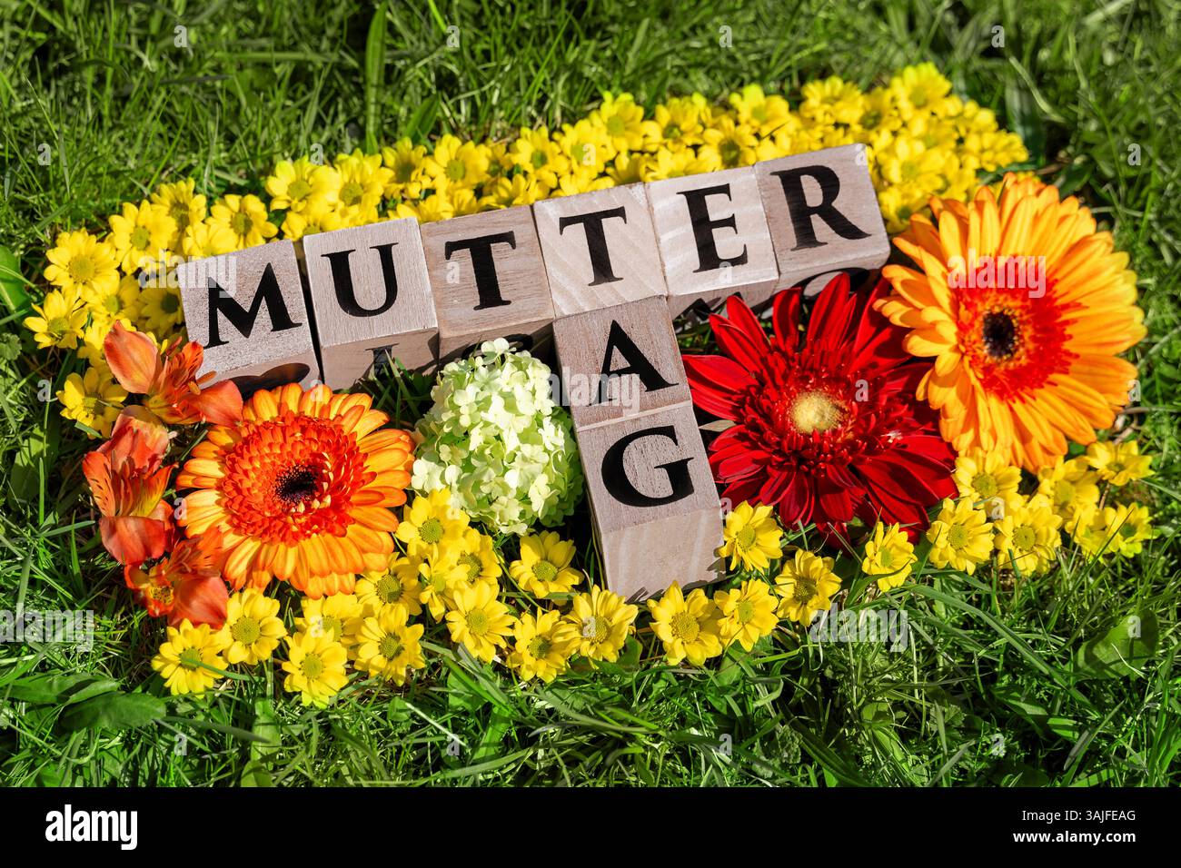 Bavaria, Germany - 10 April 2025: Wooden letters in the grass form the ...