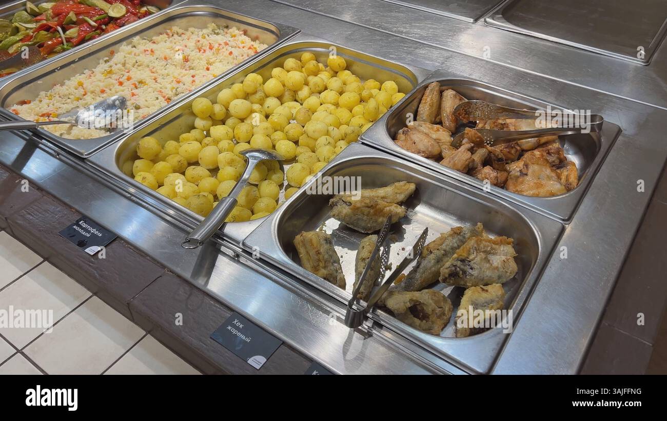 Self-service restaurant offering various dishes including potatoes ...