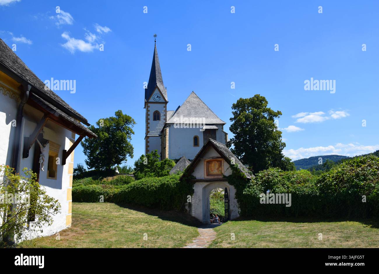 Summer travel photo capturing a traditional European chapel nestled in ...