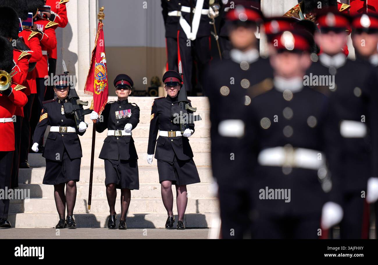 Company Sergeant Major Brunton (centre) carries the Sovereign???s ...