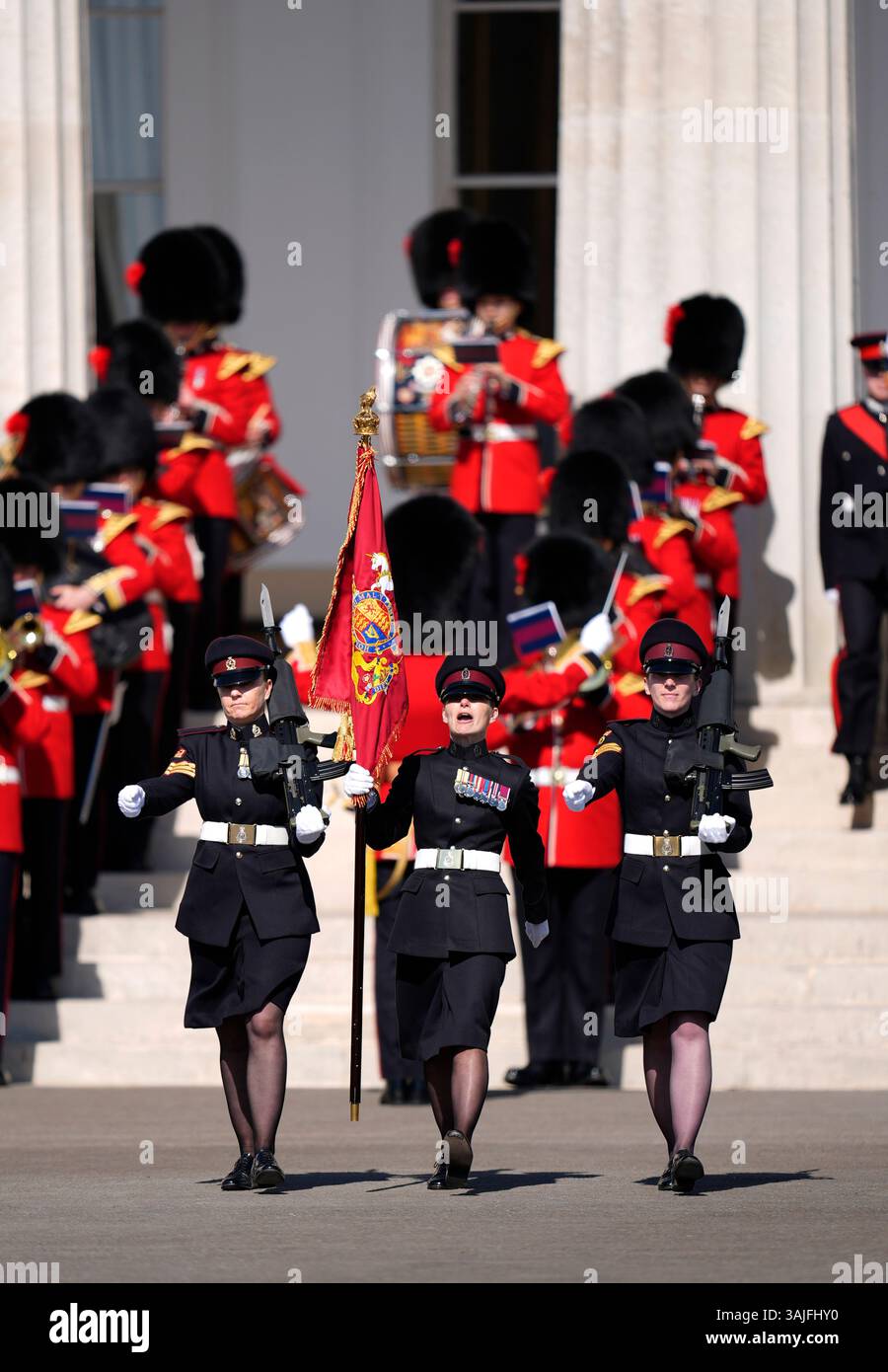 Company Sergeant Major Brunton (centre) carries the Sovereign???s ...