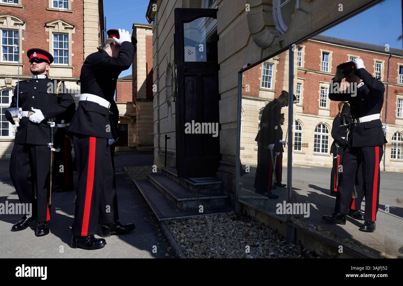 Officer cadets check their uniforms ahead of the Sovereign's Parade at ...
