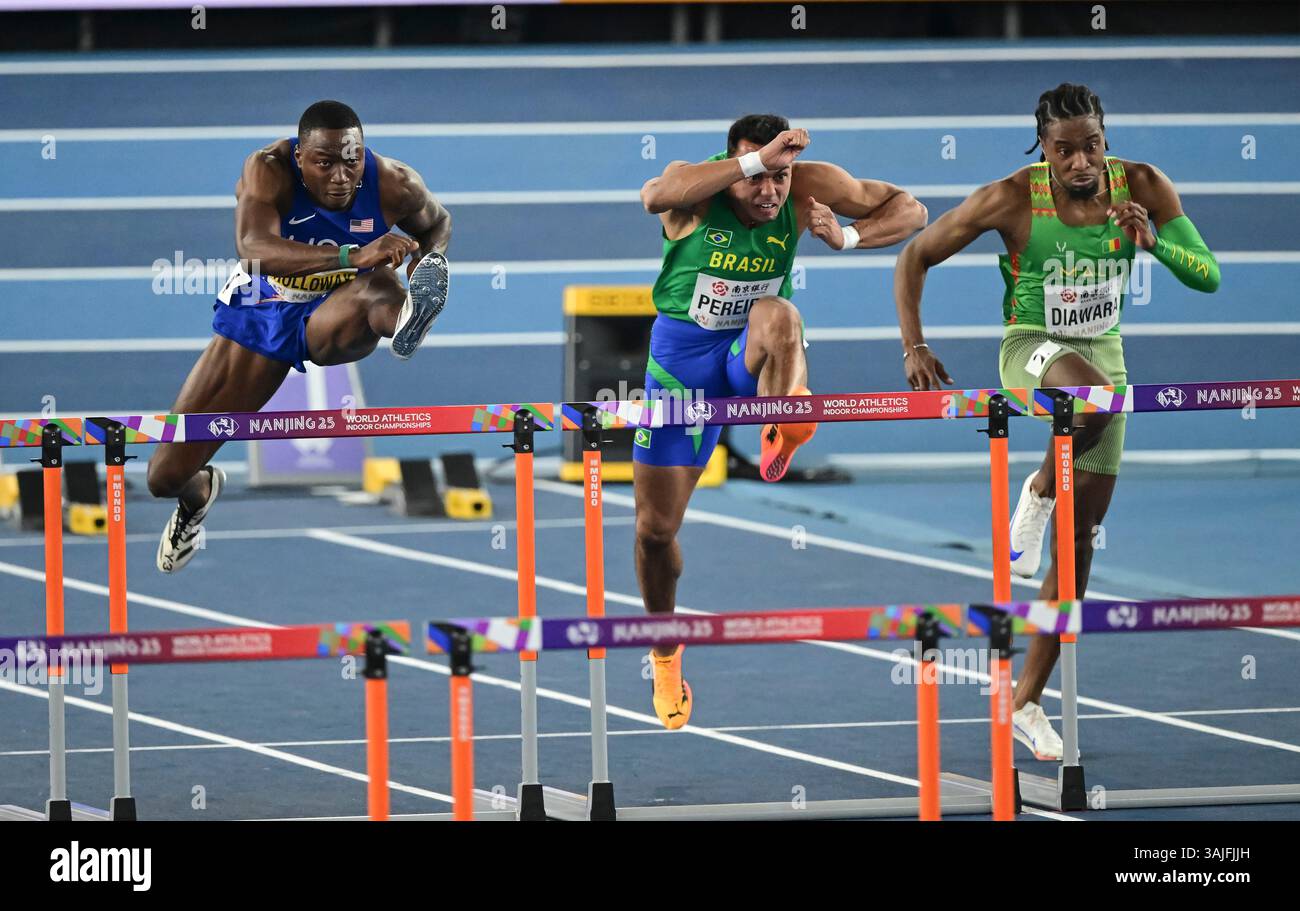 Grant Holloway of the USA, Rafael Pereira of Brazil and Richard Diawara ...
