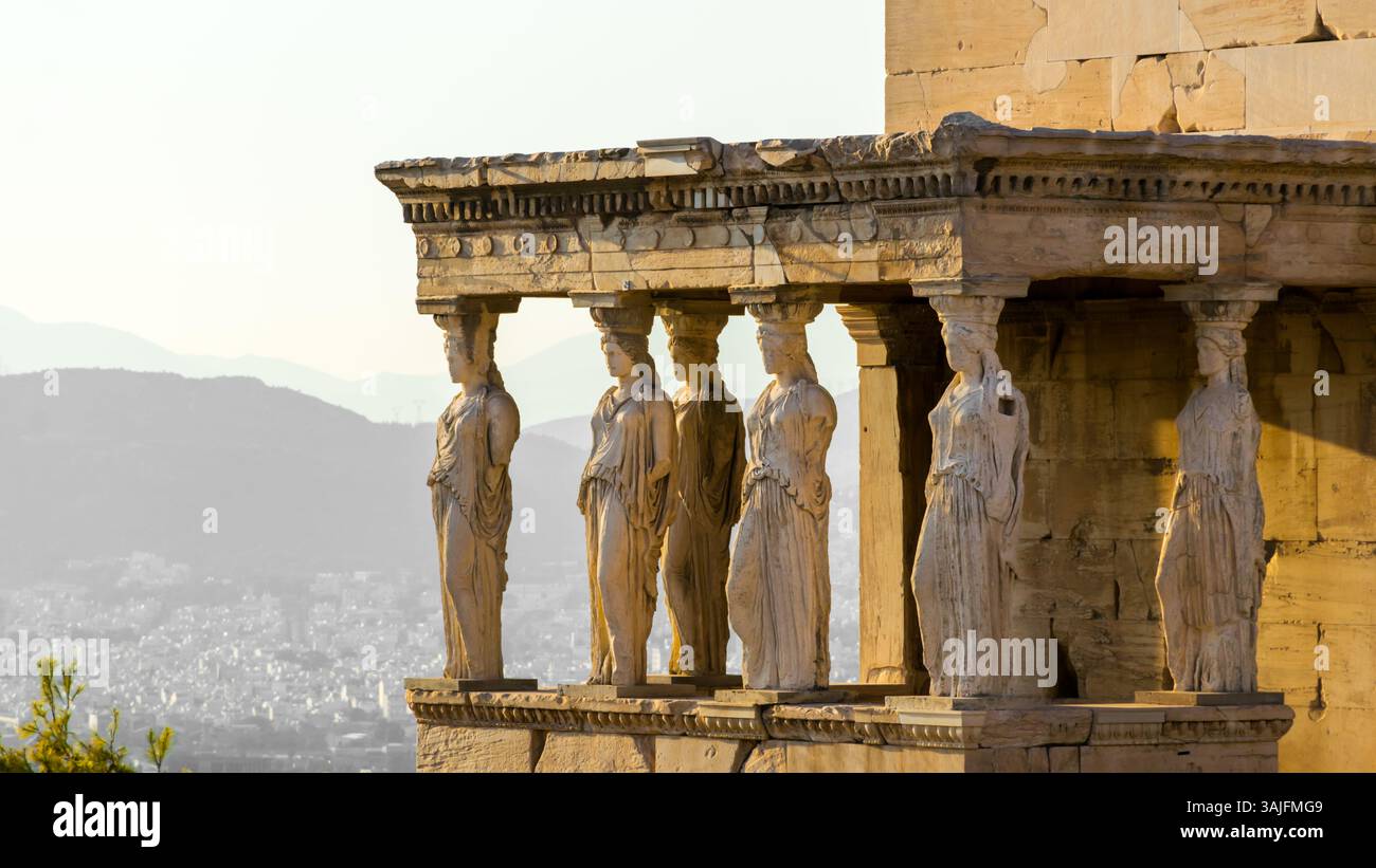 Sunset over female statues in The caryatid porch of the Erechtheion on ...