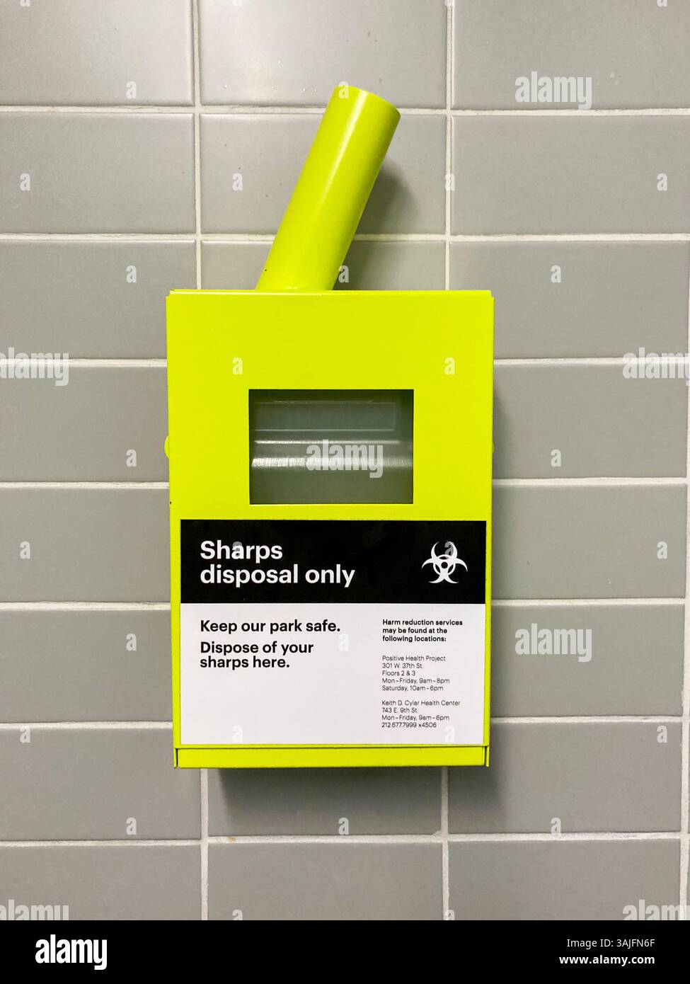 A sharps collection container in a public bathroom in New York on ...