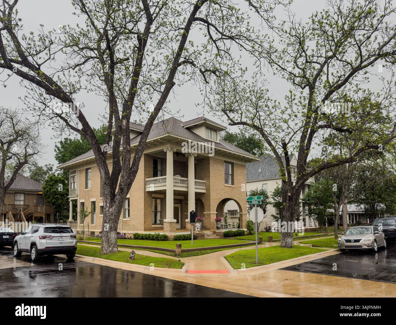 Wide shot of Katy House, a two-story bed and breakfast in the downtown historic district of ...