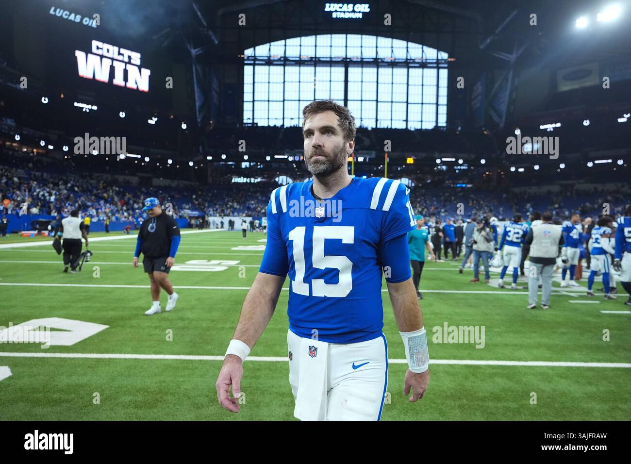 FILE - Indianapolis Colts quarterback Joe Flacco walks from the field ...