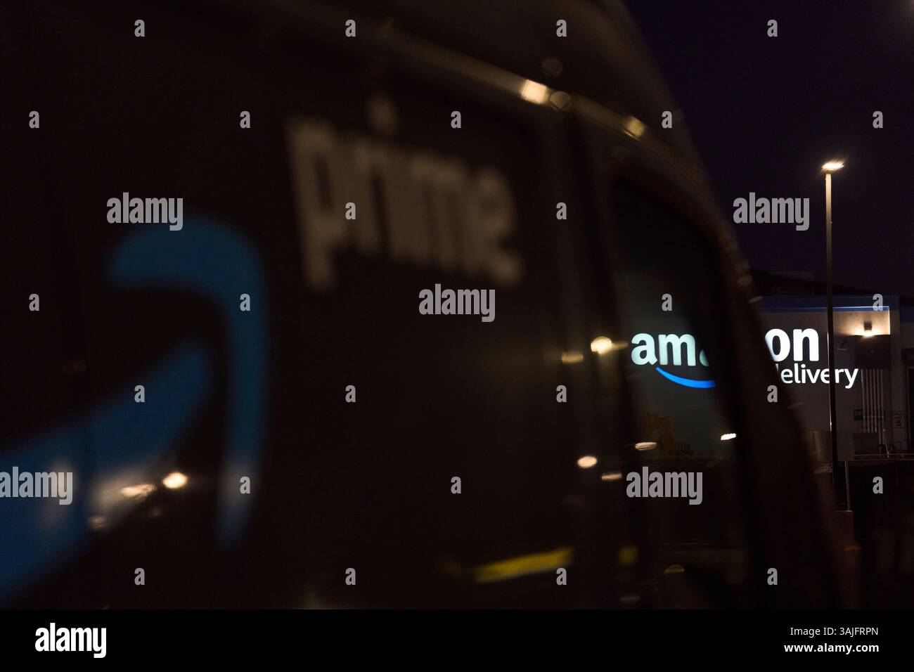 An Amazon delivery facility is seen in the early morning hours in the ...