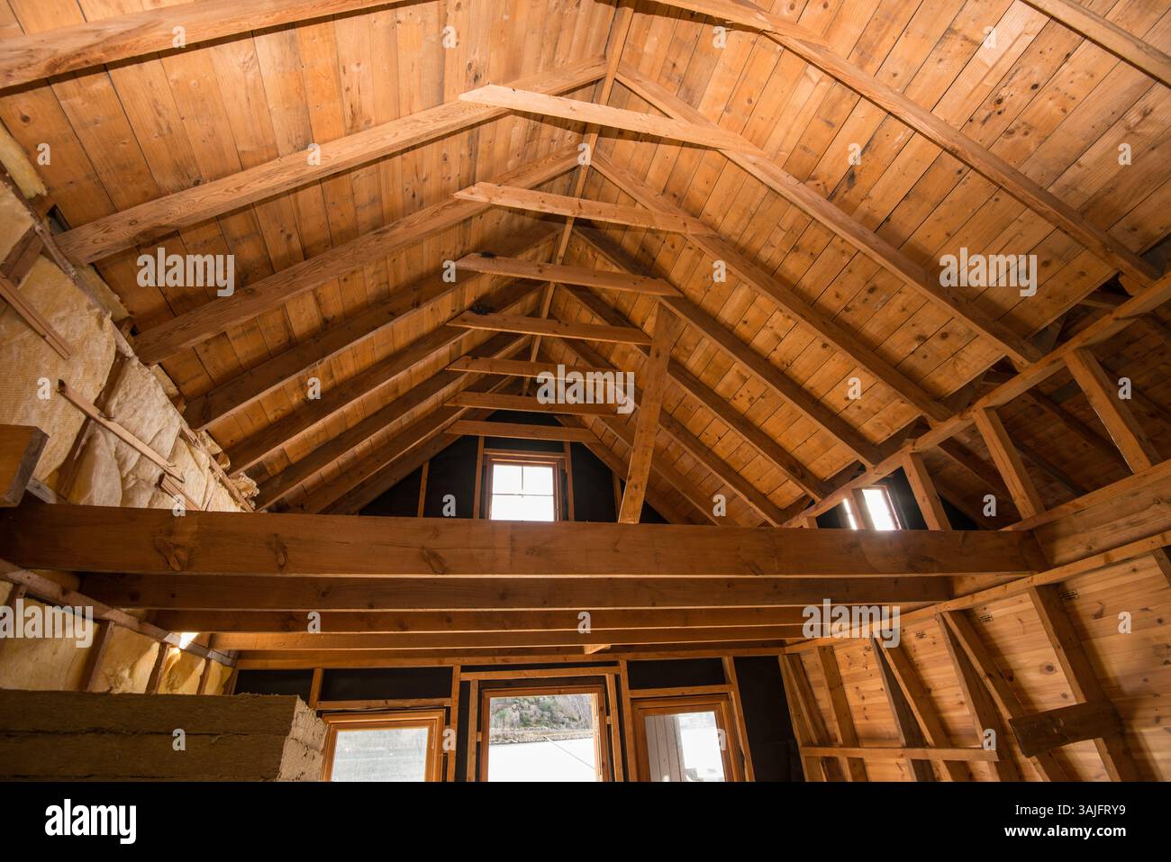Exposed wooden ceiling beams inside unfinished cabin Stock Photo - Alamy