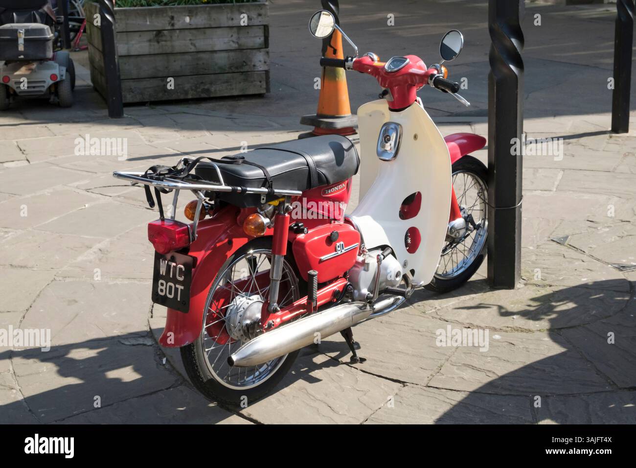 A restored red 1979 Honda Cub C90 seen in Stroud town centre Stock Photo - Alamy