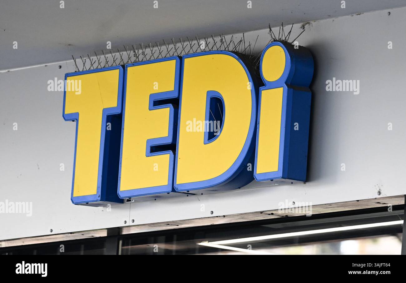 11 April 2025, Baden-Württemberg, Stuttgart: A logo of the Tedi retail ...