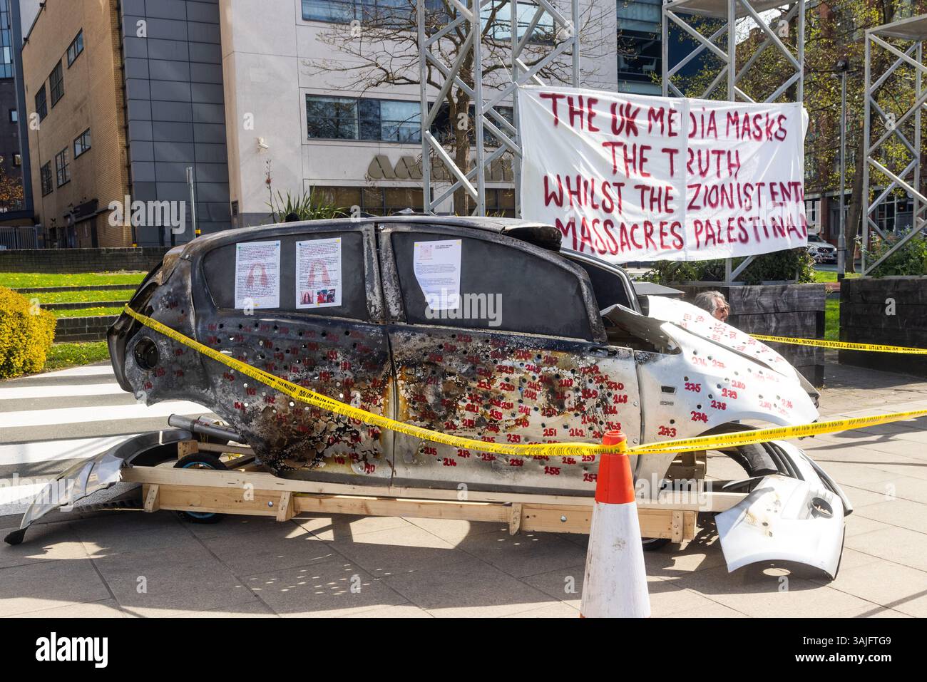 Leeds, UK. 11 APR, 2025. Car prop with 335 numbered bullet holes ...