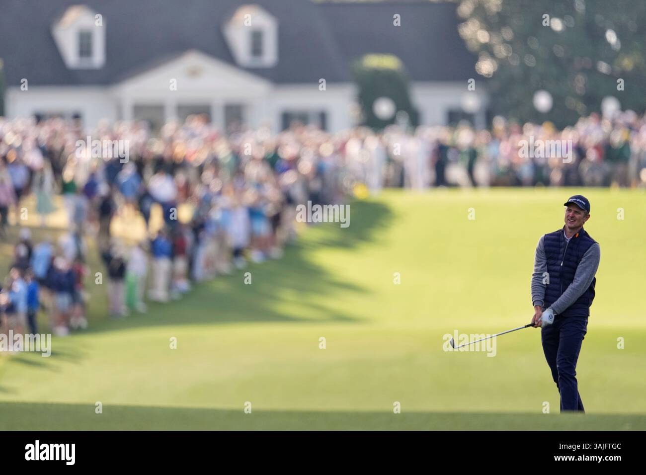 Justin Rose hits from the fairway on the first hole during the second ...