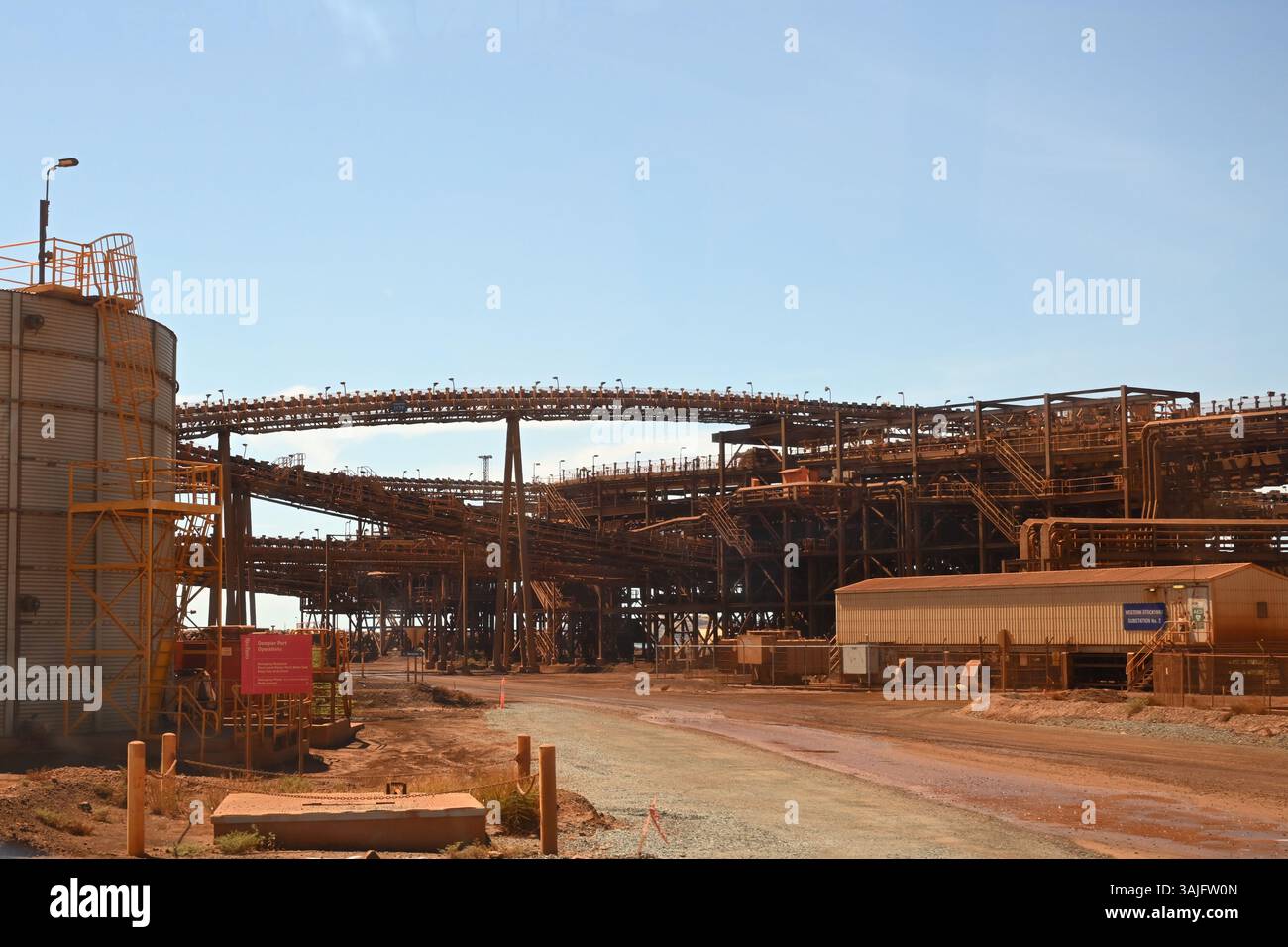 Karratha, Australia. 11th Apr, 2025. Conveyor belts carrying iron ore ...