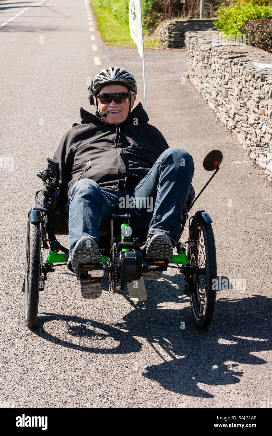 Senior man riding recumbent trike in County Kerry, Ireland Stock Photo ...
