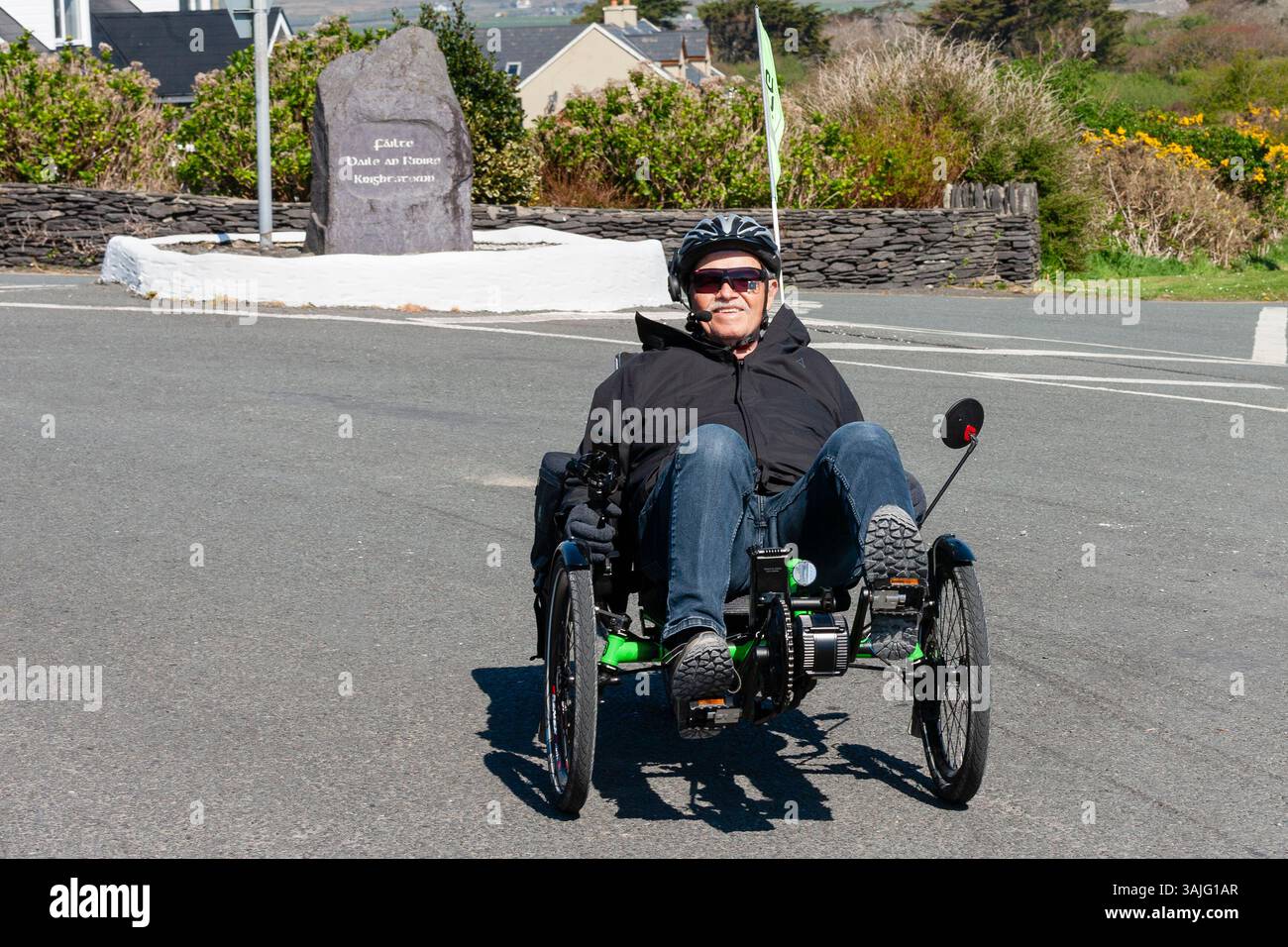 Senior man riding recumbent trike in County Kerry, Ireland Stock Photo ...