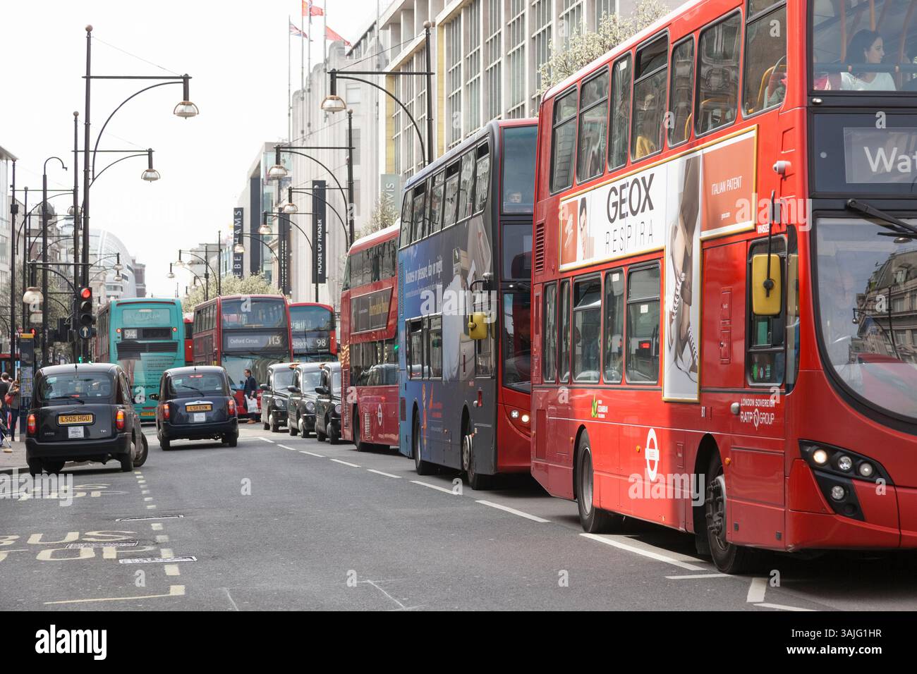 Shoppers compete with the risk presented by busy London traffic of ...