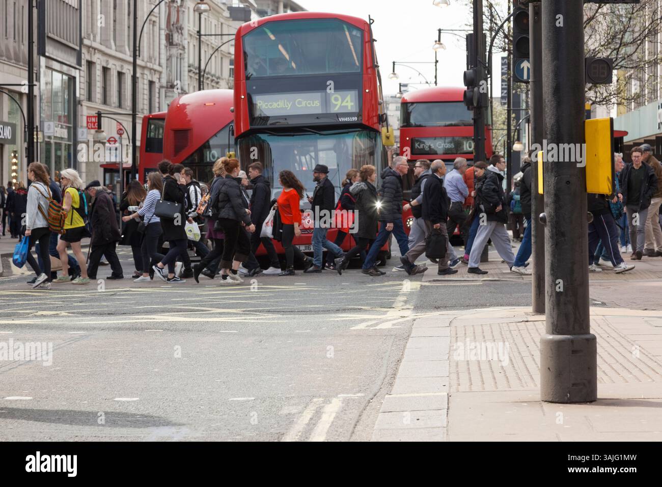 Shoppers compete with the risk presented by busy London traffic of ...