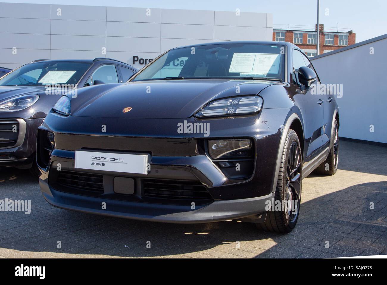 Porsche Macan 4 Electric SUV on display in Preston, UK Stock Photo - Alamy