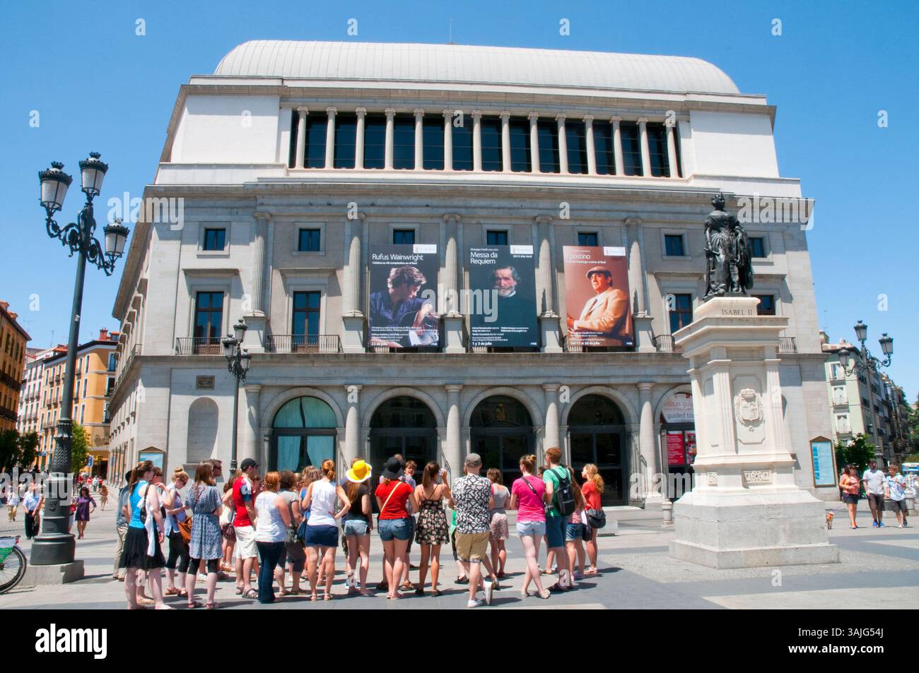 Group of tourists at Isabel II Square. Madrid, Spain Stock Photo - Alamy