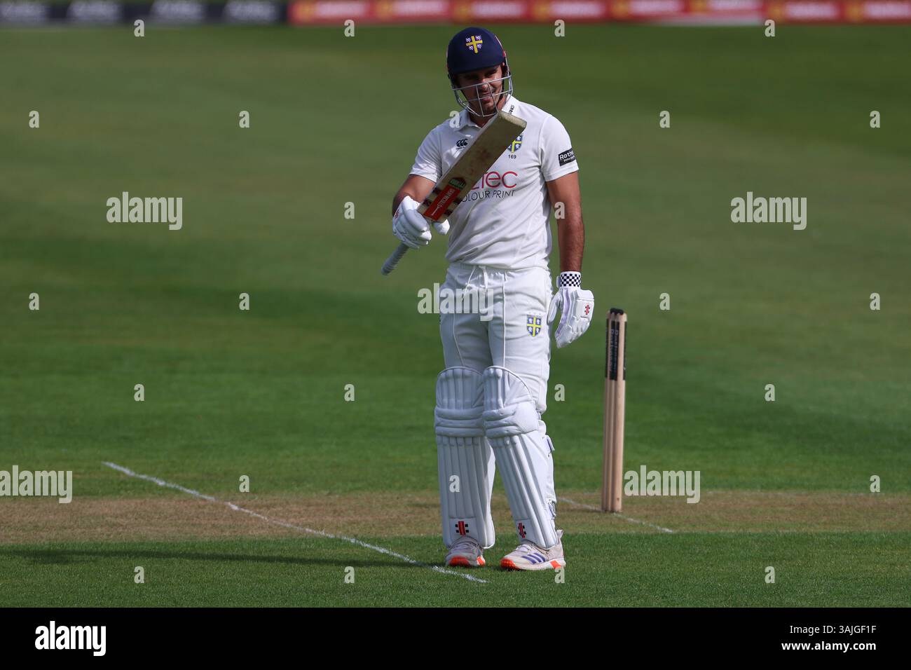Durham's Ben McKinney celebrates his fifty during the First Day of the ...