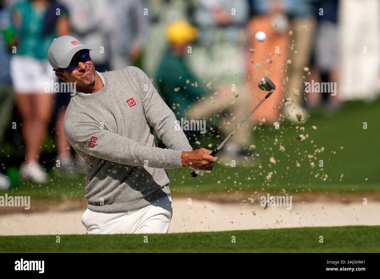 Adam Scott hits from the bunker on the second hole during the second ...