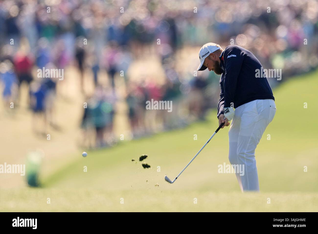 Shane Lowry, of Ireland, hits from the fairway on the first hole during ...