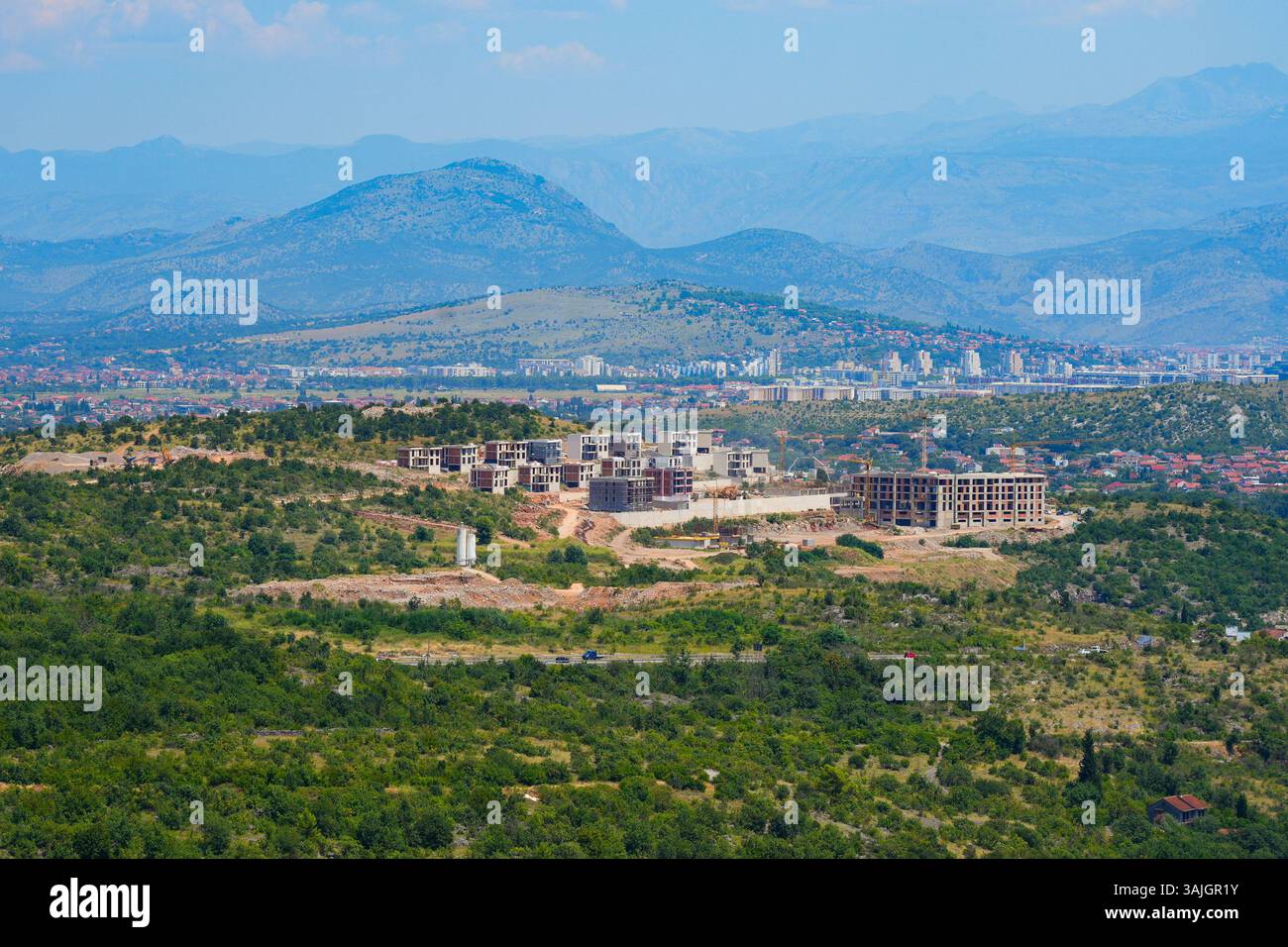Residential buildings in construction on the outskirts of Podgorica ...