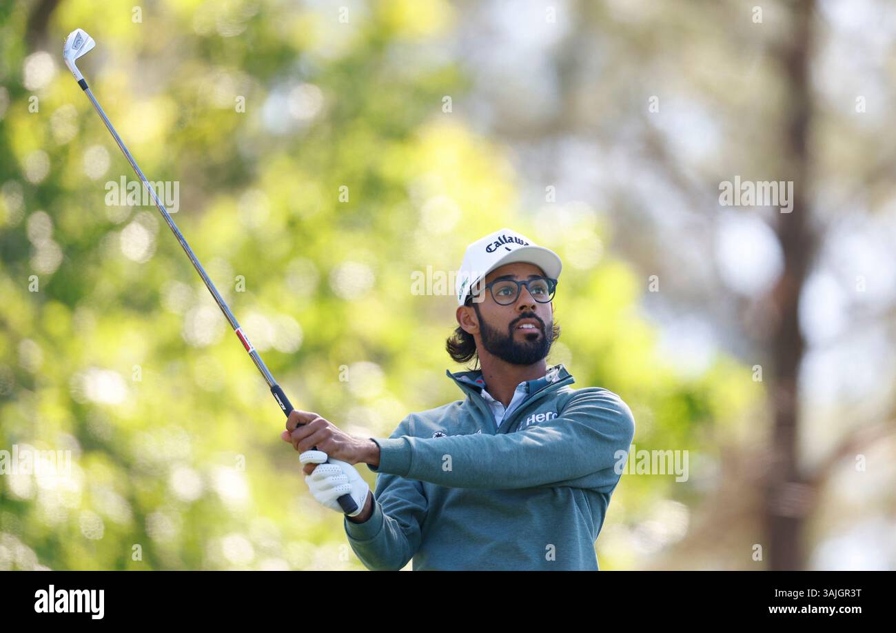 Akshay Bhatia watches his tee shot on the fourth hole during round two of the 2025 Masters golf ...