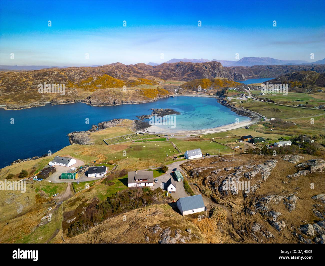 Aerial view of village and beach at Scourie, Scottish Highlands ...