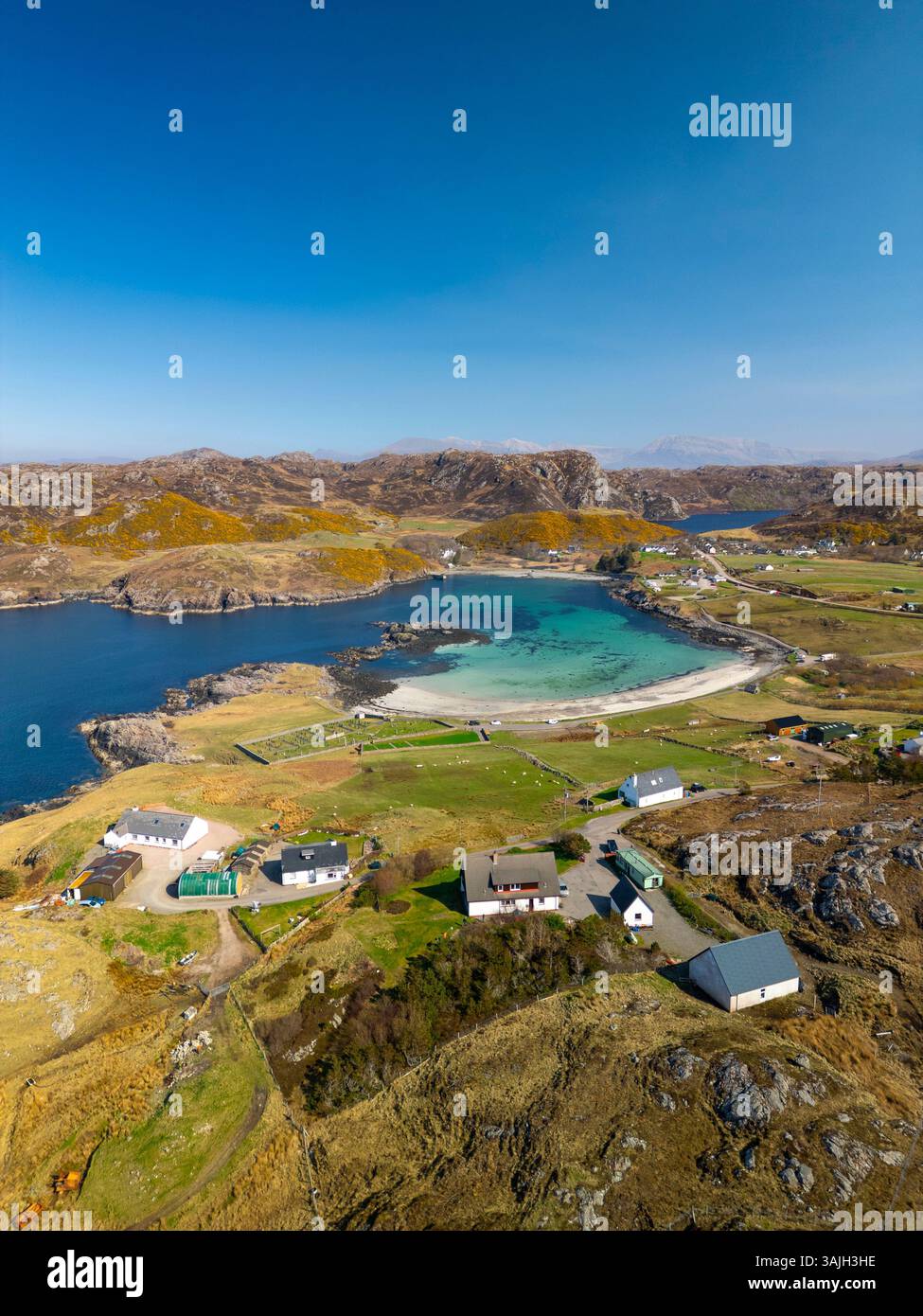 Aerial view of village and beach at Scourie, Scottish Highlands ...