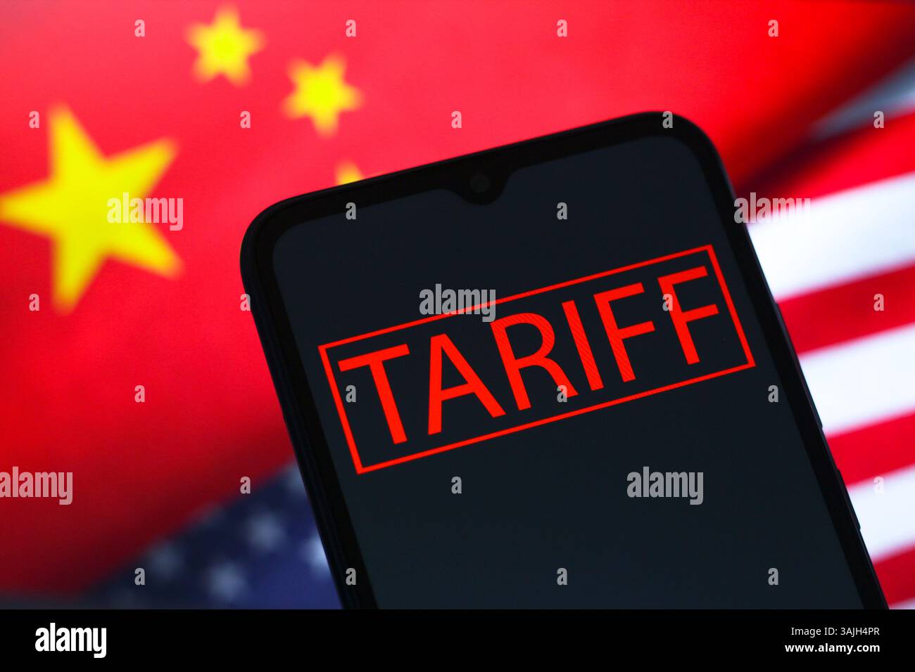 In this photo illustration, the Tariff text is seen displayed on a ...