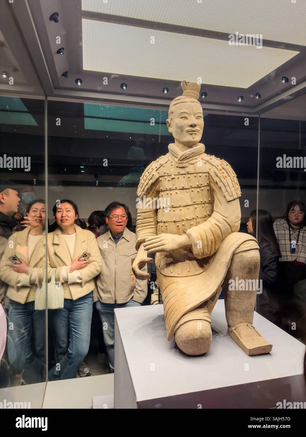 March 27, 2025. Xian, China, Terracotta Army warrior, Kneeling Archer in a museum disply case ...