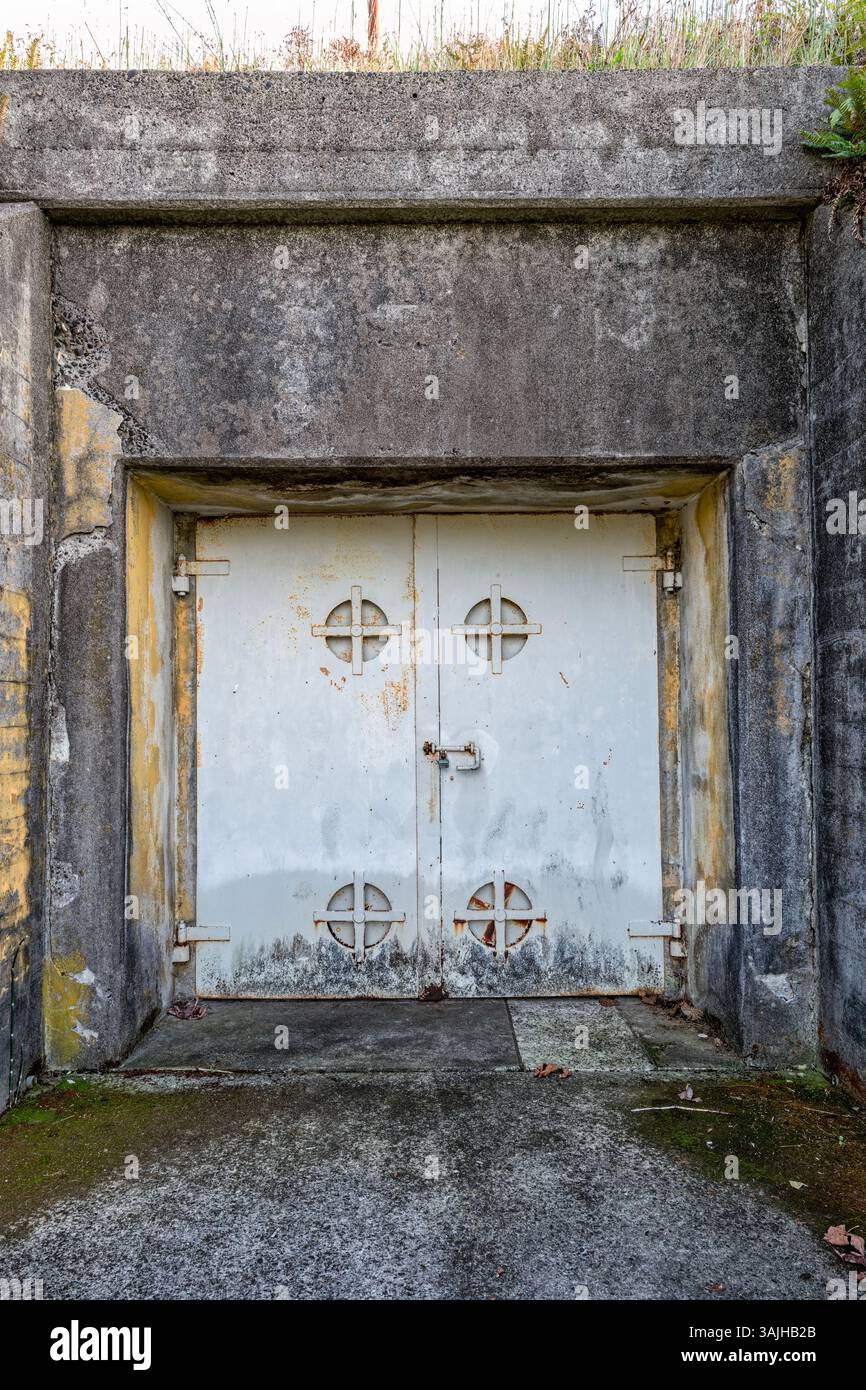 The white metal doors to an underground military bunker for coastal ...