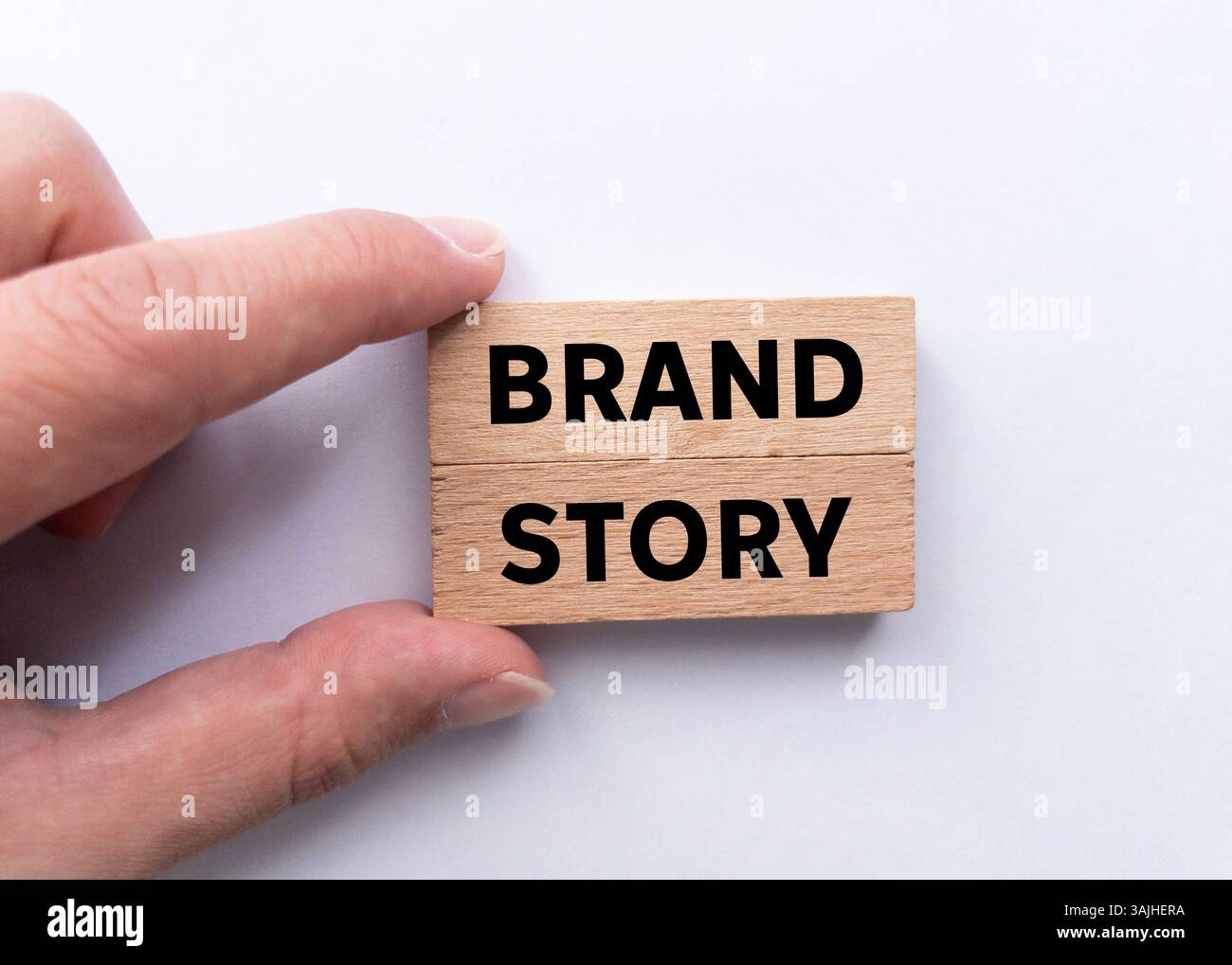 Brand story message written on wooden blocks on white background ...