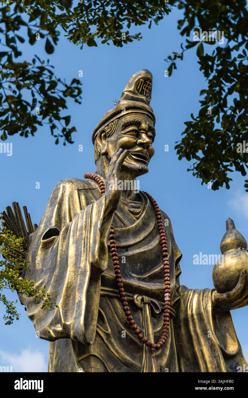 Majestic Ji Gong Statue: Tallest in Malaysia, Standing Proud in Yong Peng Stock Photo - Alamy