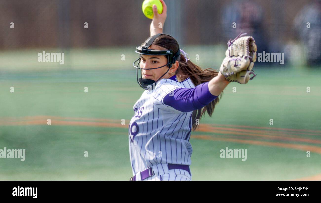 Holy Cross pitcher Sophia Roncone (19) delivers a pitch during an NCAA ...